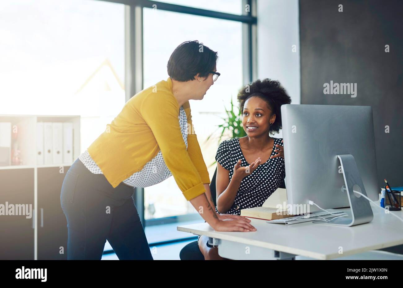 Theyre confident in their creative environment. two young businesswomen ...
