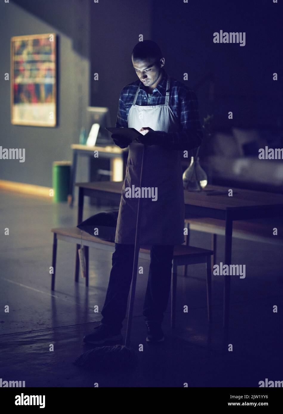 Working alone at night shop hi-res stock photography and images - Alamy
