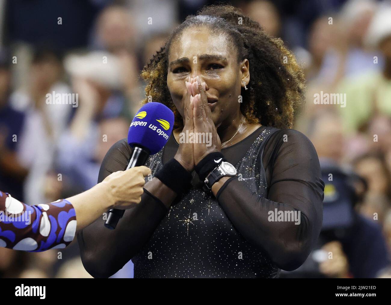Flushing Meadow, USA. 02nd Sep, 2022. Serena Williams fights back tears as she gives an on court ...