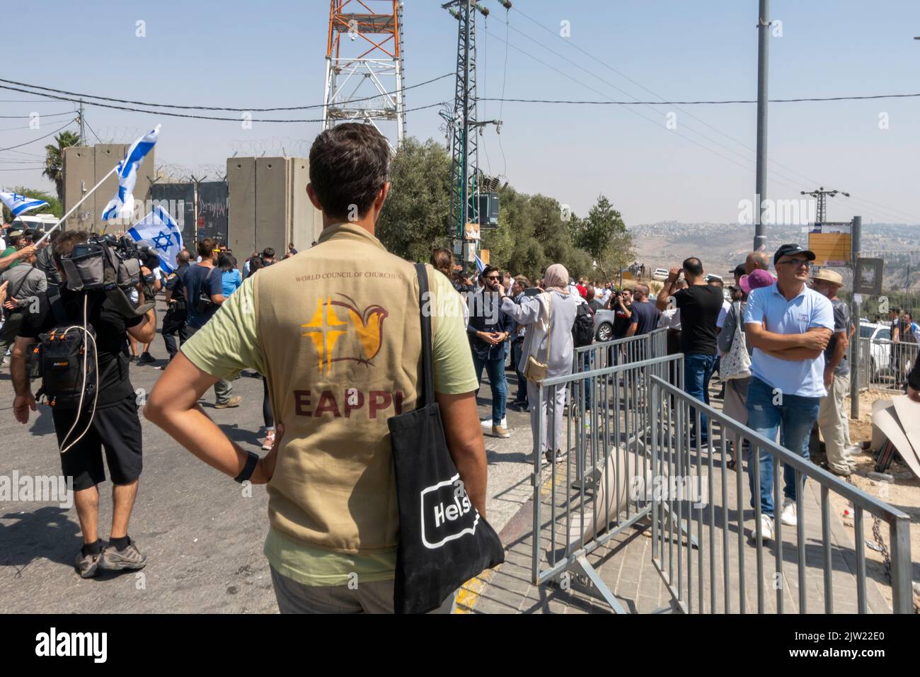An observer of EAPPI organization observes during a demonstration held ...
