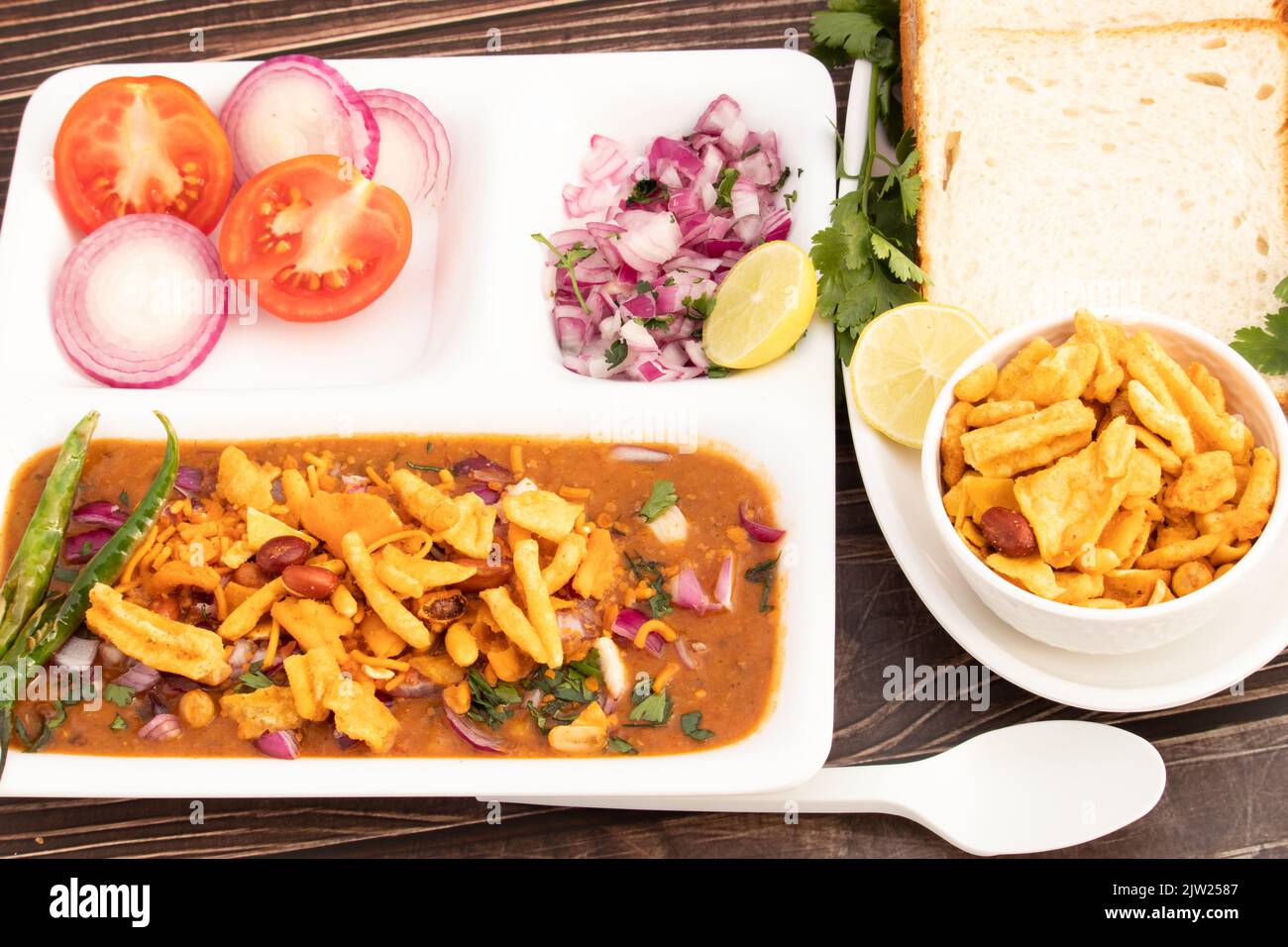 Misal Pav Or Usal Paav Is Famous Maharashtrian Spiced Street Dish. Buns ...