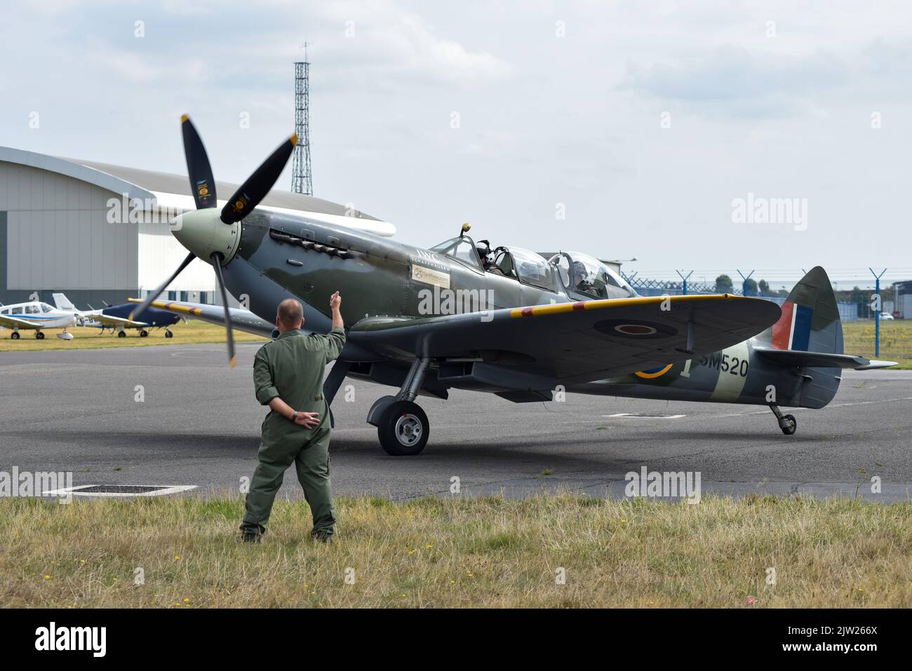 SM250 twin seat Spitfire taxiing on the runway of Solent airport while ...