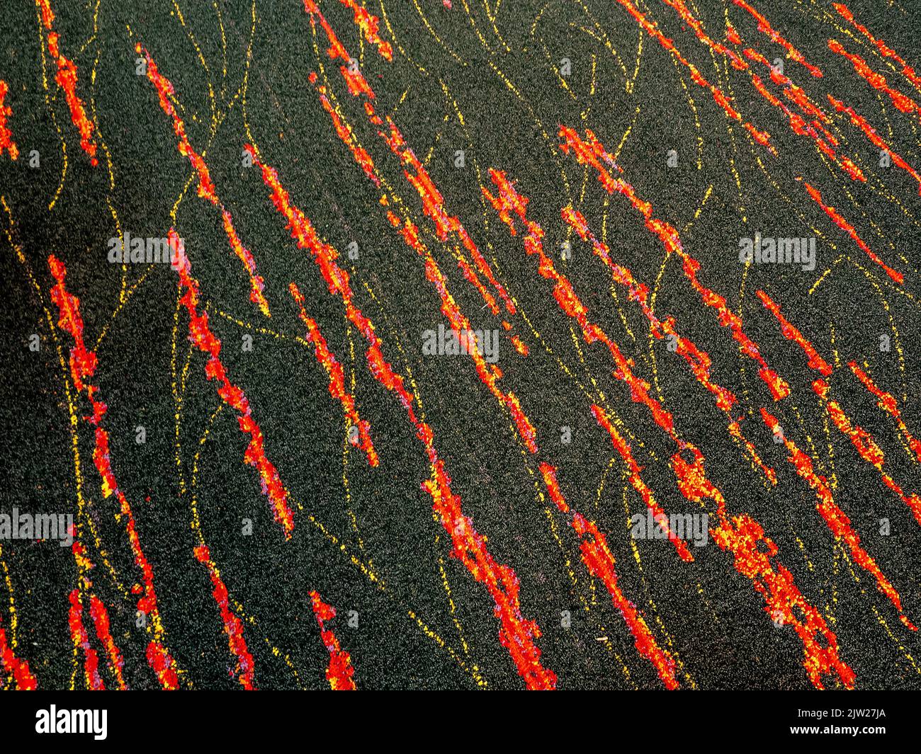 The red pattern looked like a flame on the floor carpet Stock Photo - Alamy