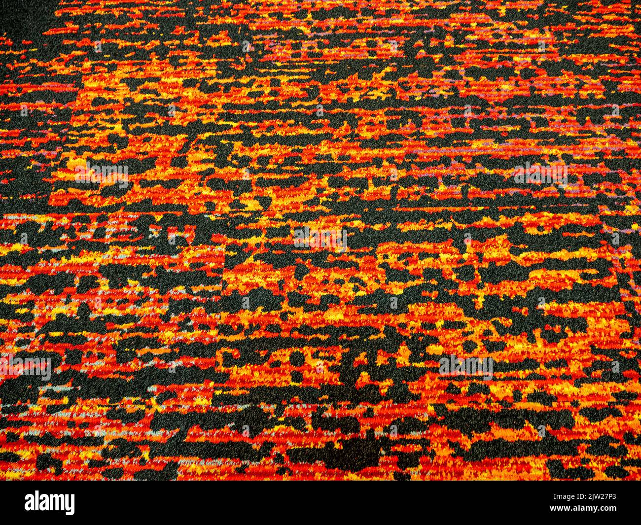 The red pattern looked like a flame on the floor carpet Stock Photo - Alamy