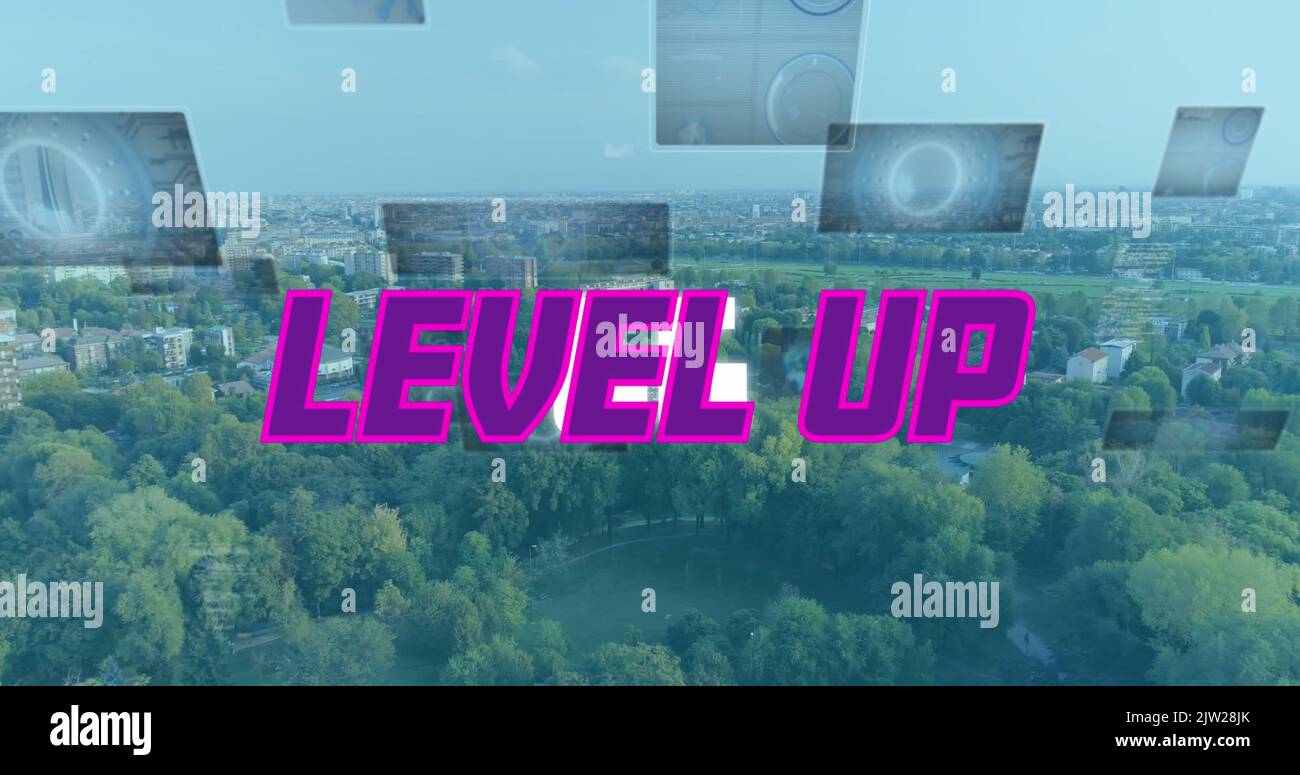 Image of level up text and data processing over cityscape Stock Photo ...