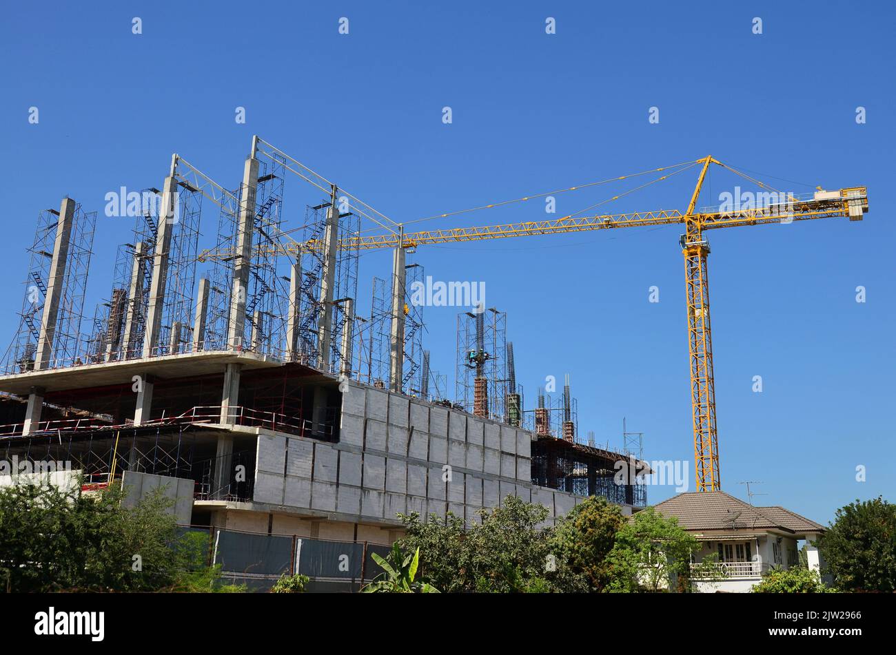 Asian labor people and thai labour workers use machine and heavy ...