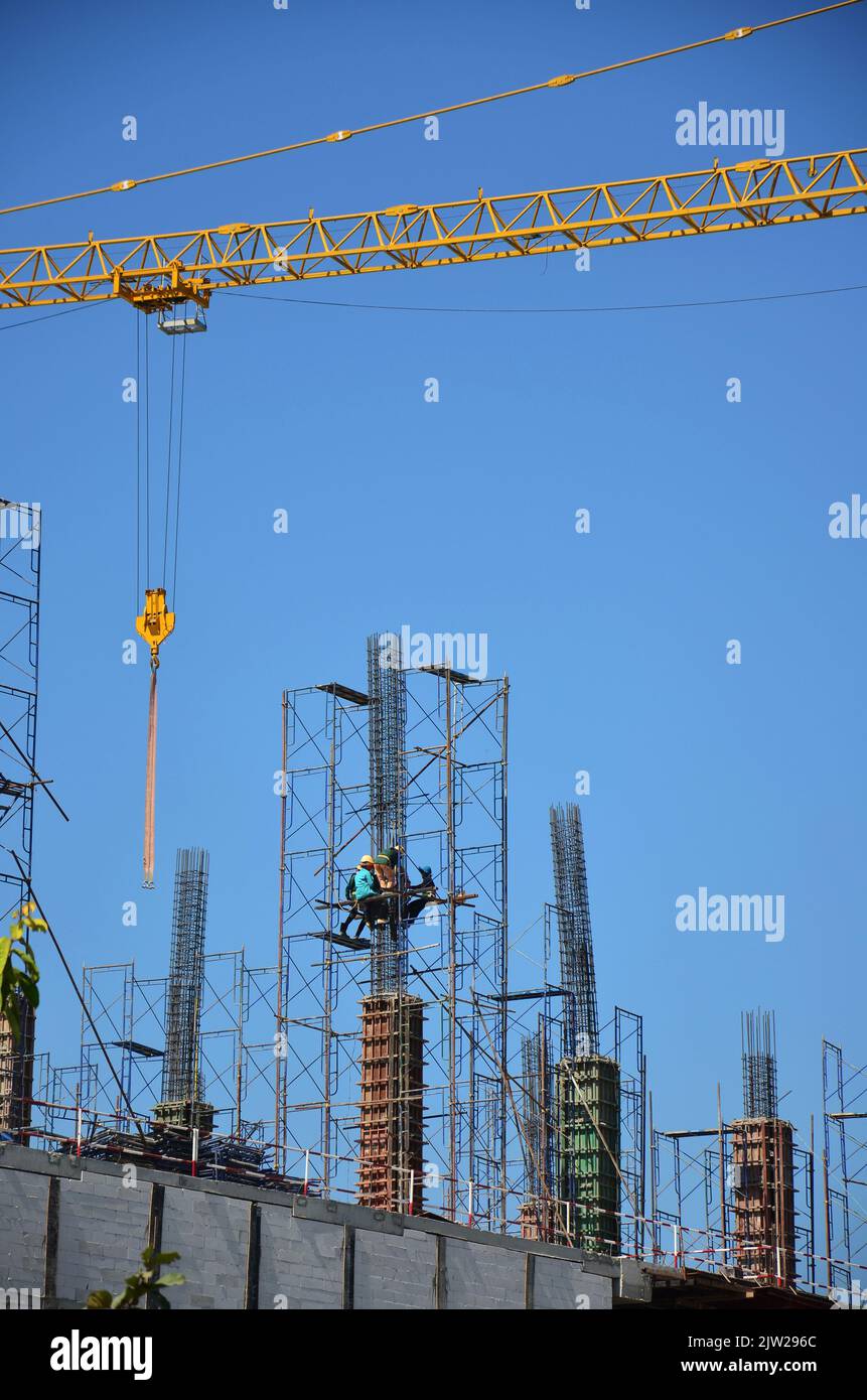 Asian labor people and thai labour workers use machine and heavy ...