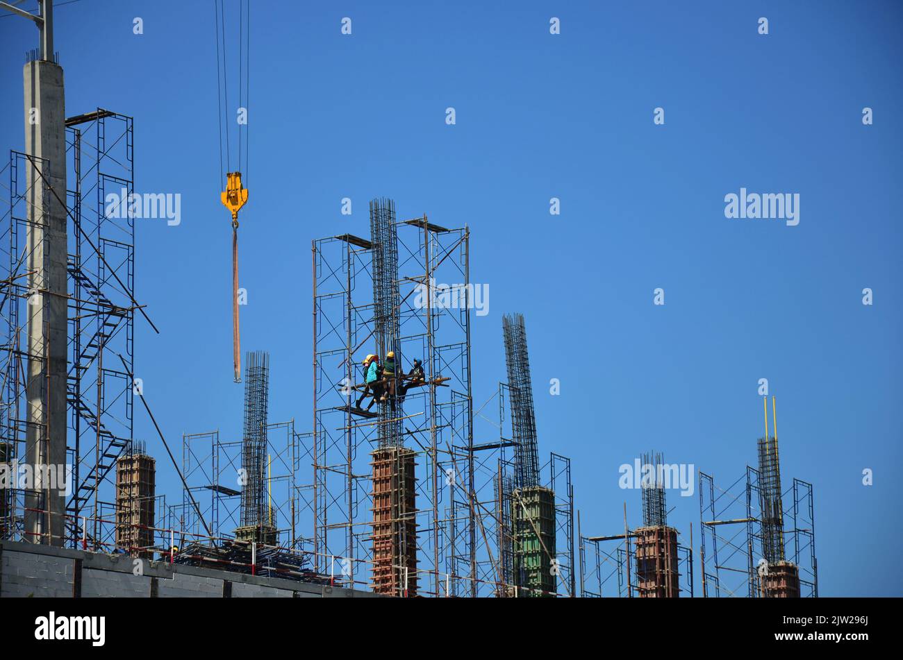 Asian labor people and thai labour workers use machine and heavy ...