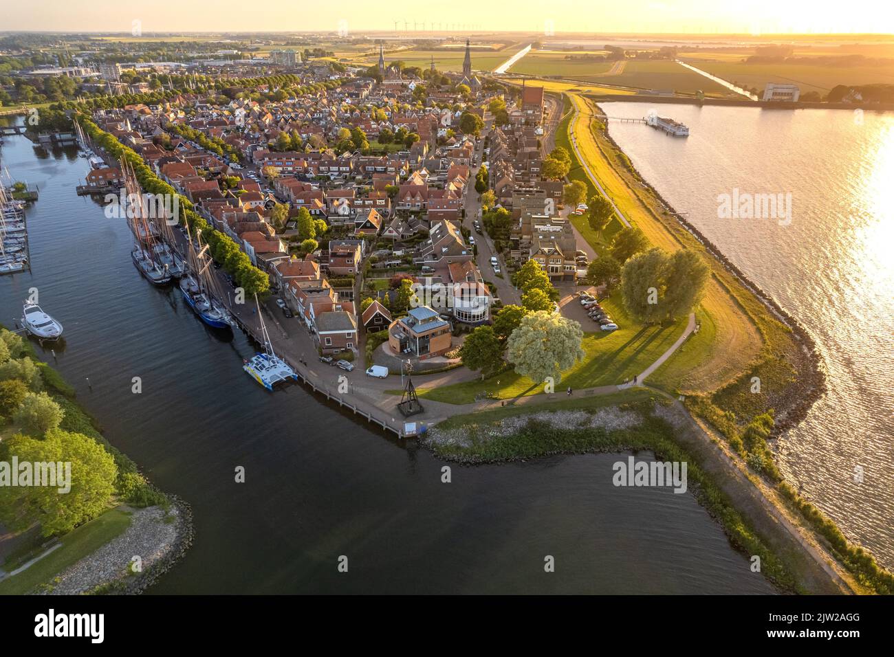 Aerial view of a coastal town at sunset, Ijsselmeer, Medemblik ...