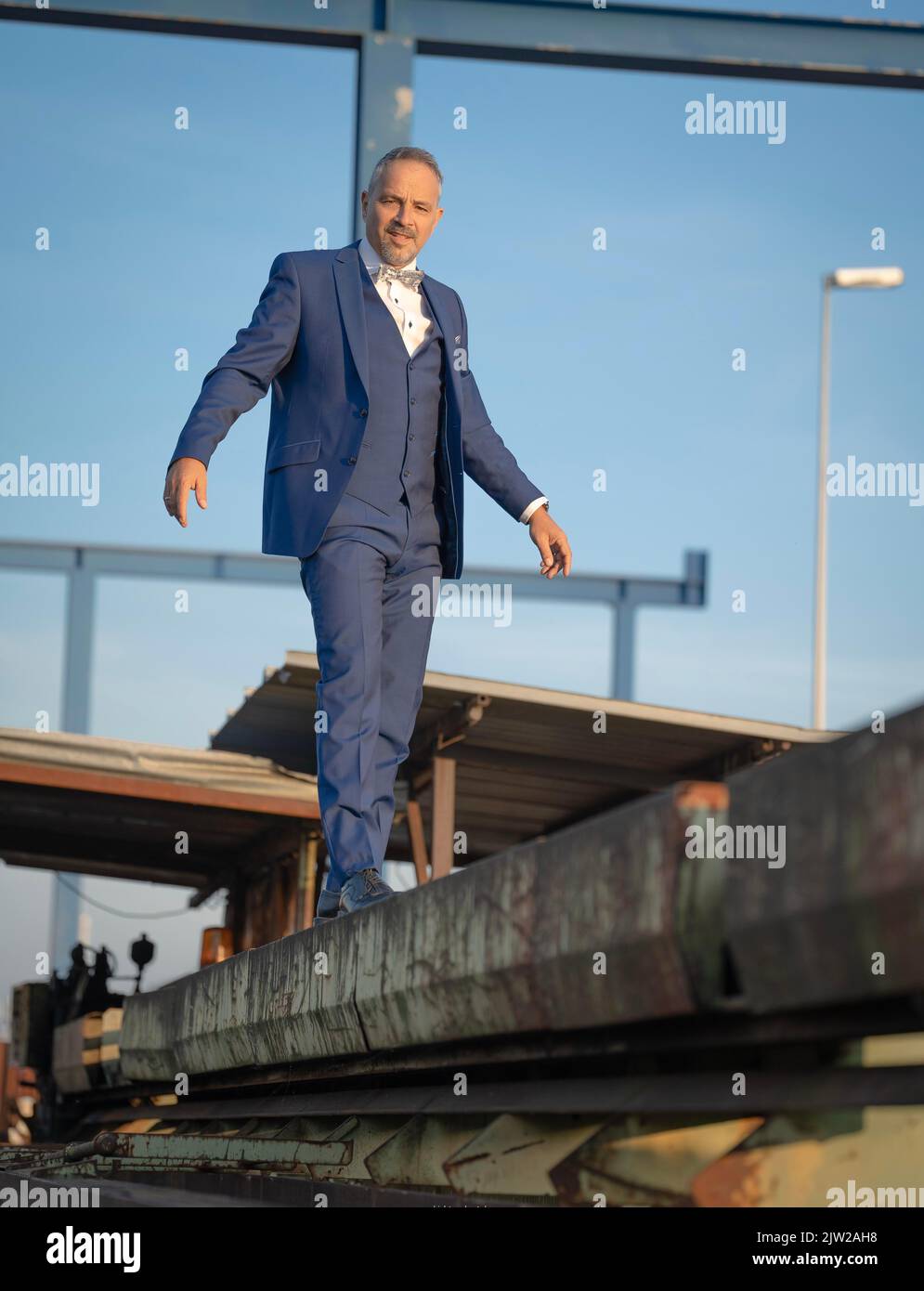Mafia Boss in blue suit at the harbour, Rheinhafen, Karlsruhe Stock ...
