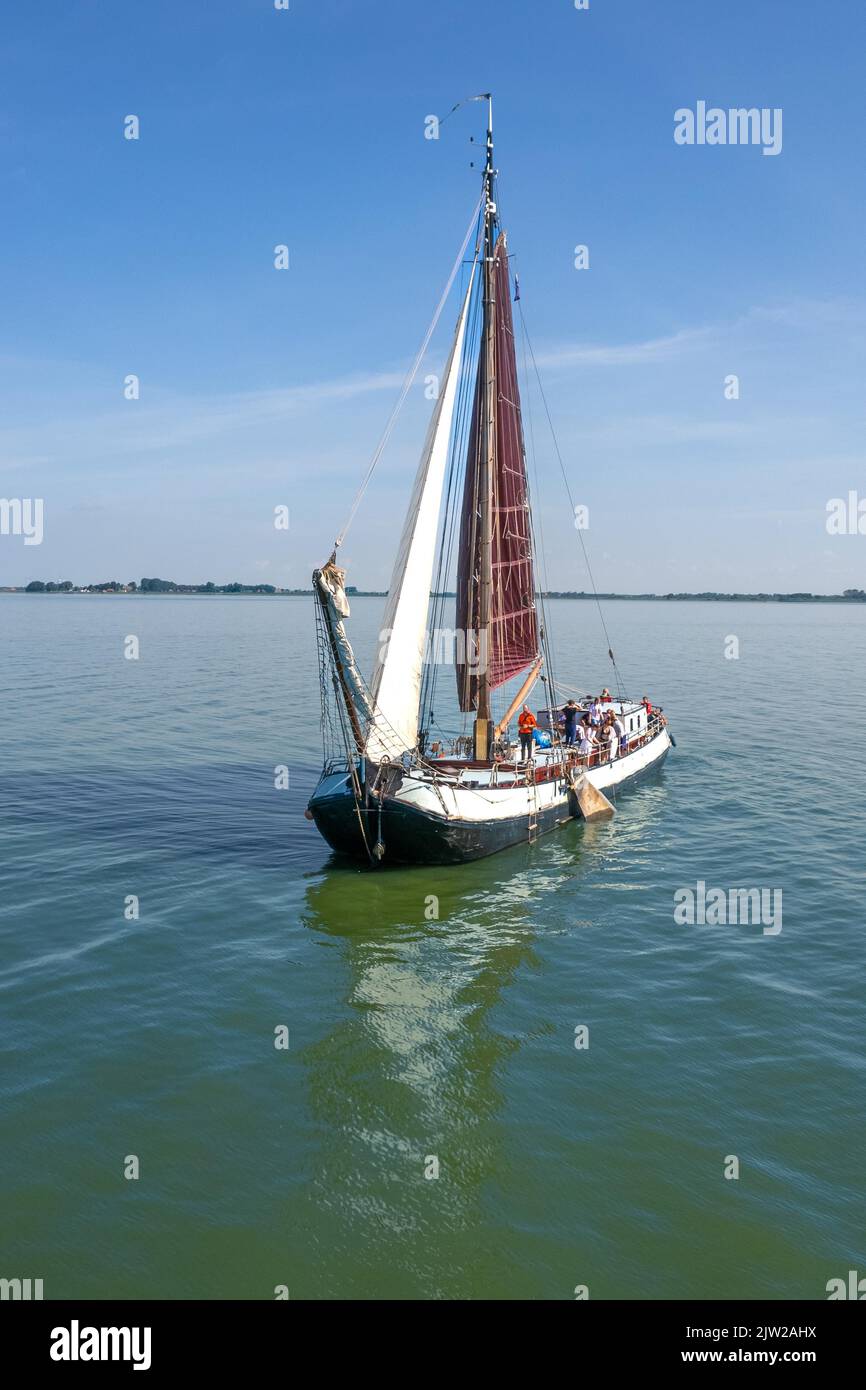 Historic sailing ship with red sails, Ijsselmeer, Netherlands Stock ...