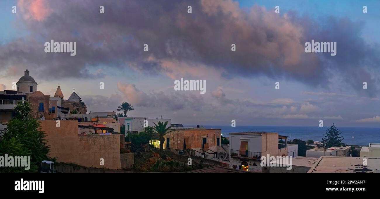 San Vincenzo island village and Stromboli volcano at sunset, San ...