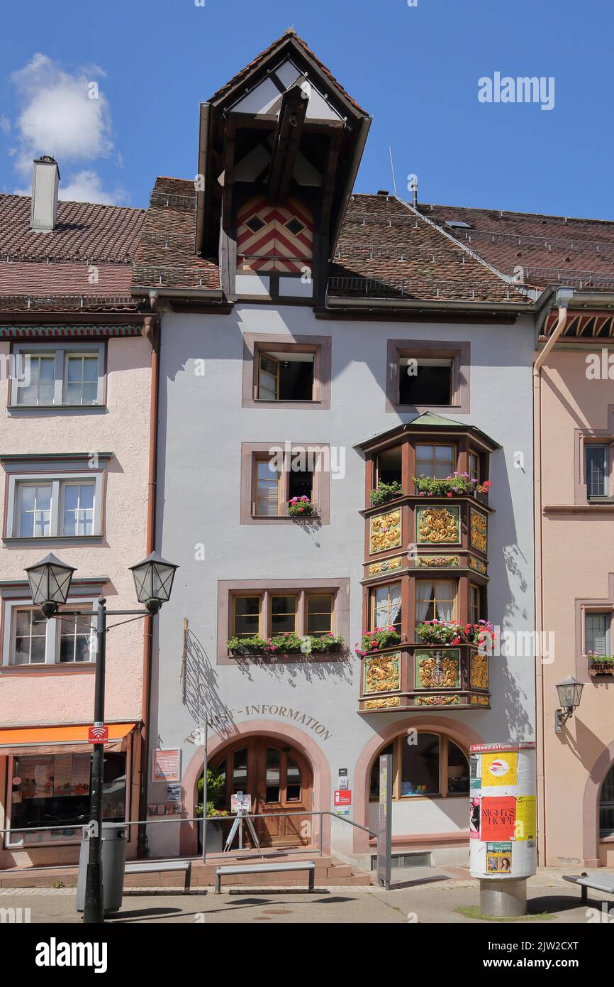Tourist information house with ornate bay window and crane dormer in ...