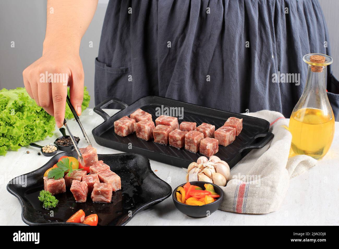 Female Chef Preparing Premium Wagyu Diced Beef or Saikoro, Marble Meat ...