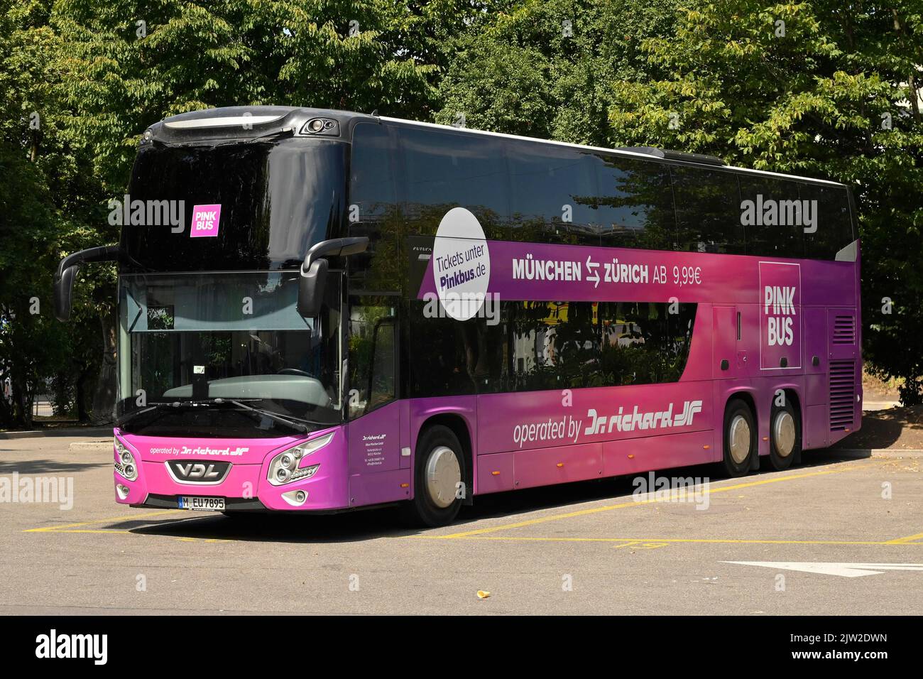 Long-distance coach Pinkbus Stock Photo - Alamy