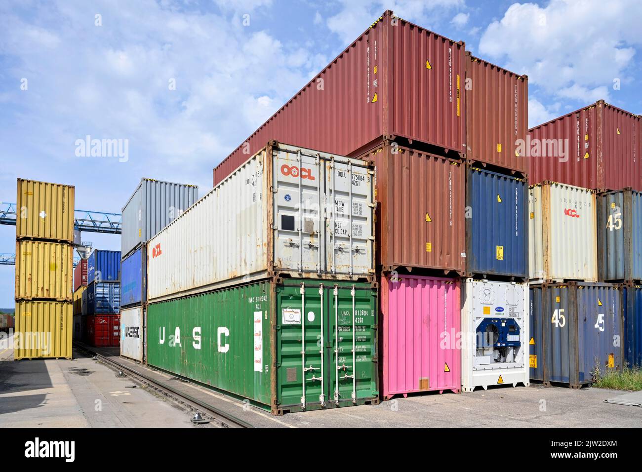 Stacked freight containers Stock Photo - Alamy