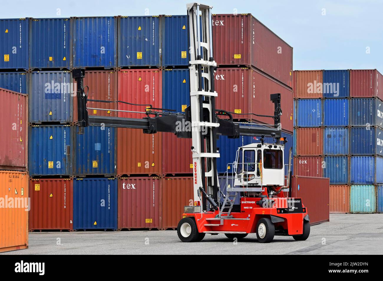 Container stacker Freight container Stock Photo - Alamy