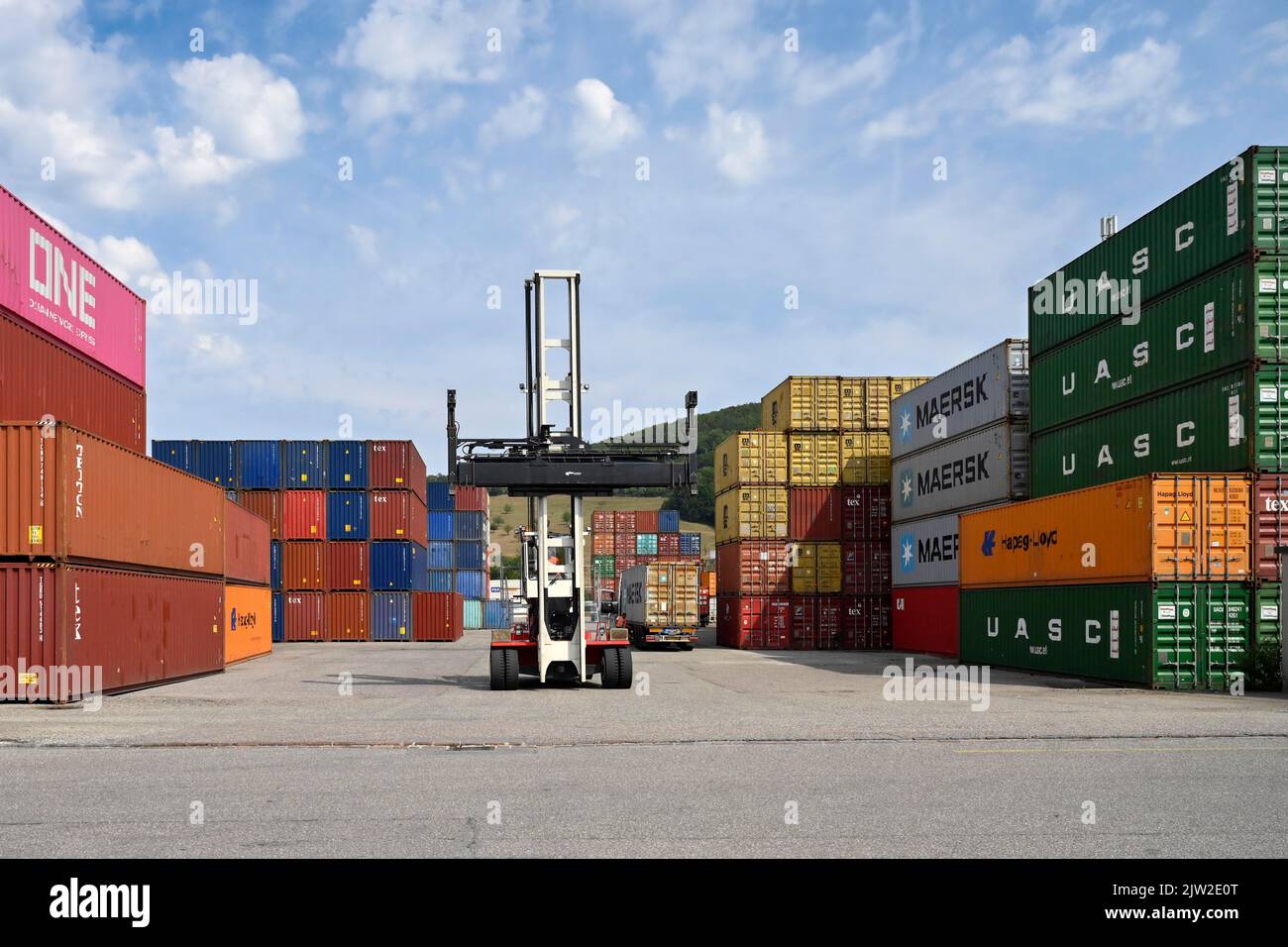 Container stacker Freight container Stock Photo - Alamy