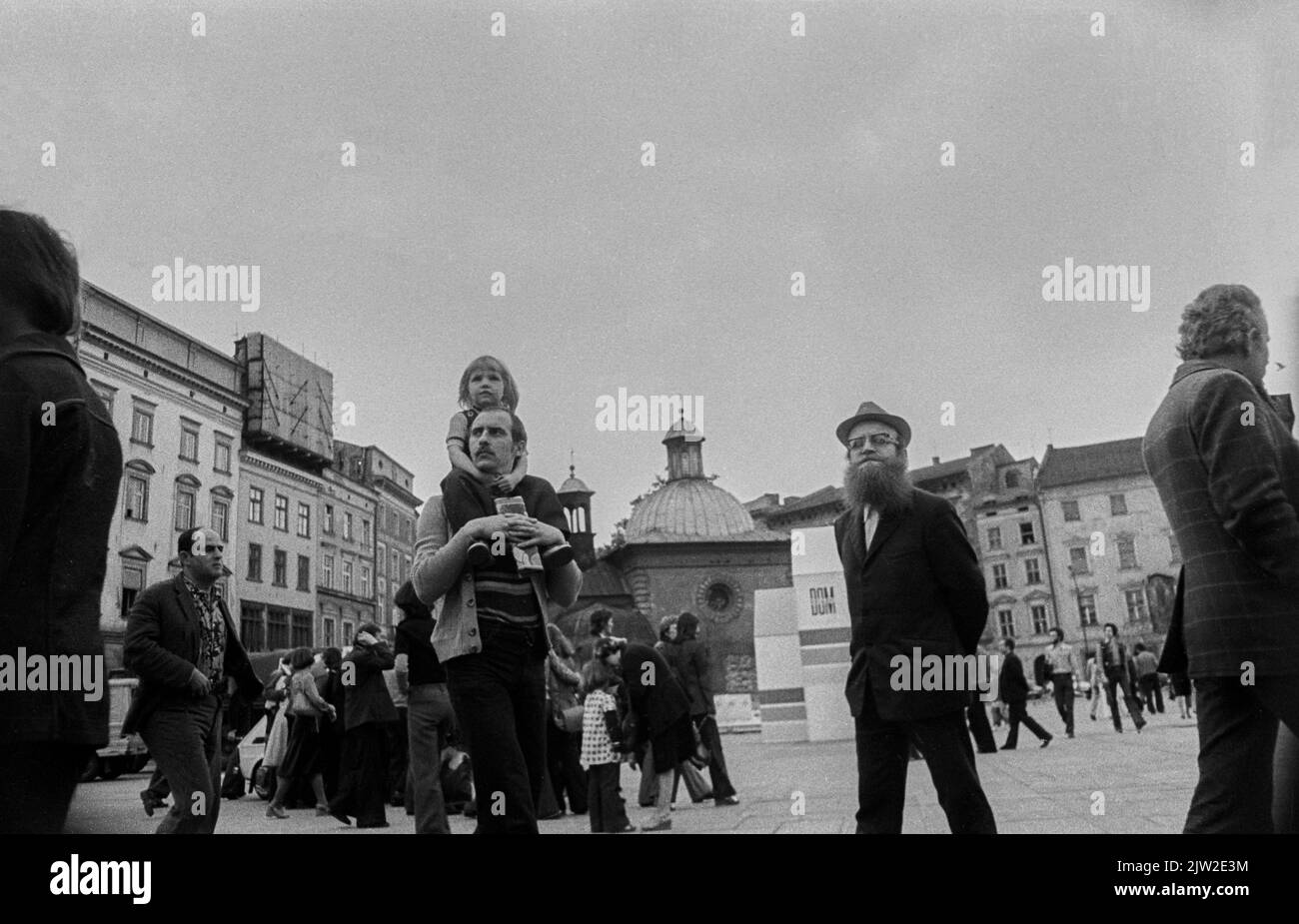 Poland, Krakow, 22. 06. 1977, market square, old town, man with child ...