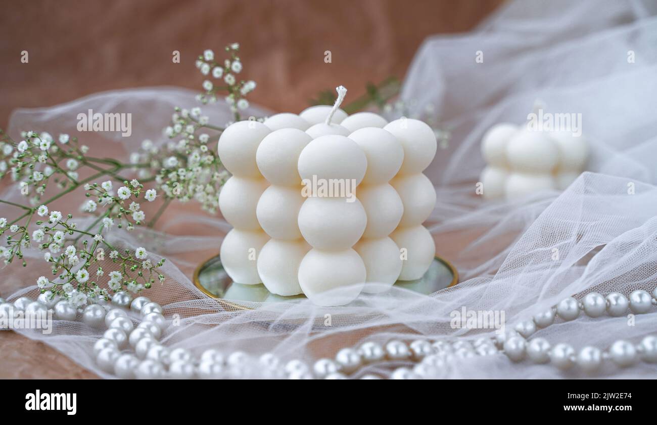 Soy handmade candles. Two natural white bubble candles. Decor Stock ...