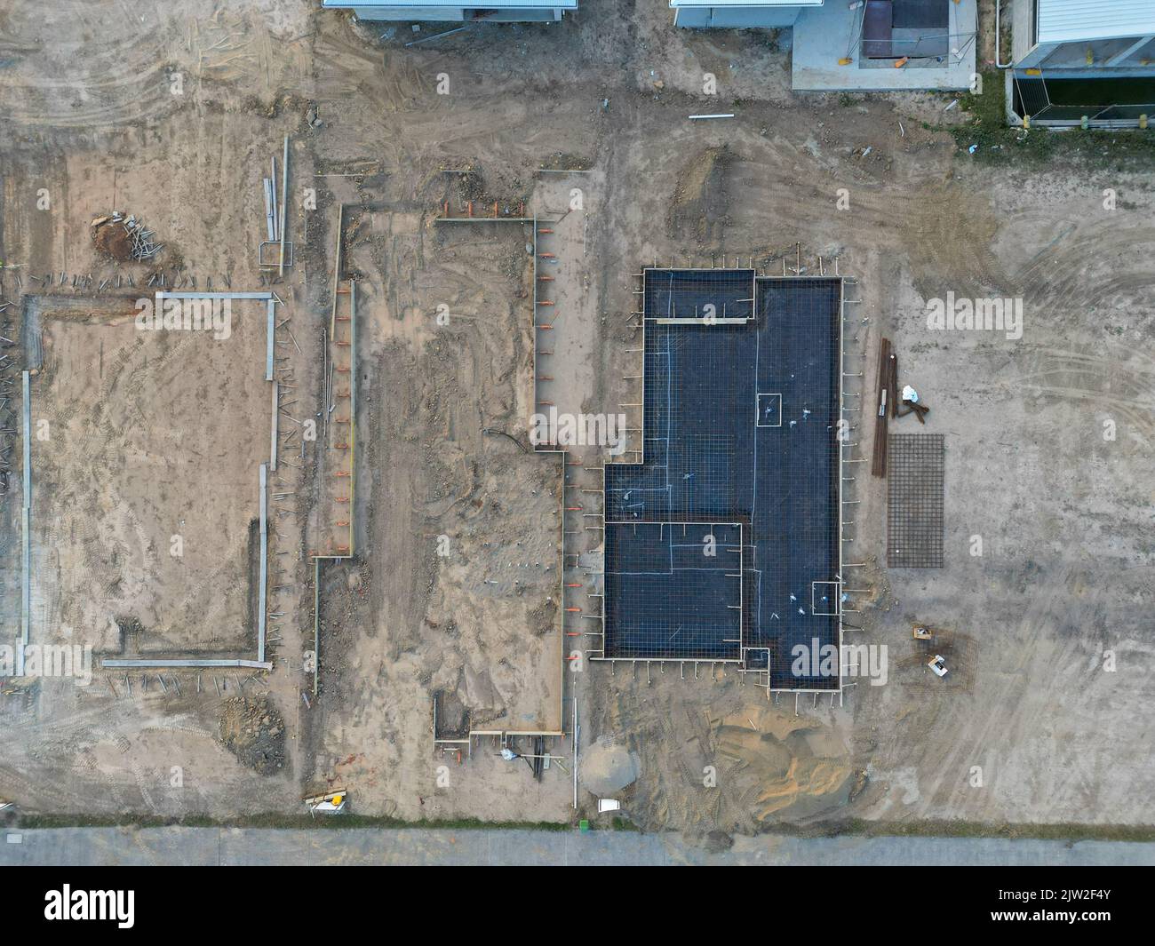 Aerial photo of construction site, new build houses at various stages ...
