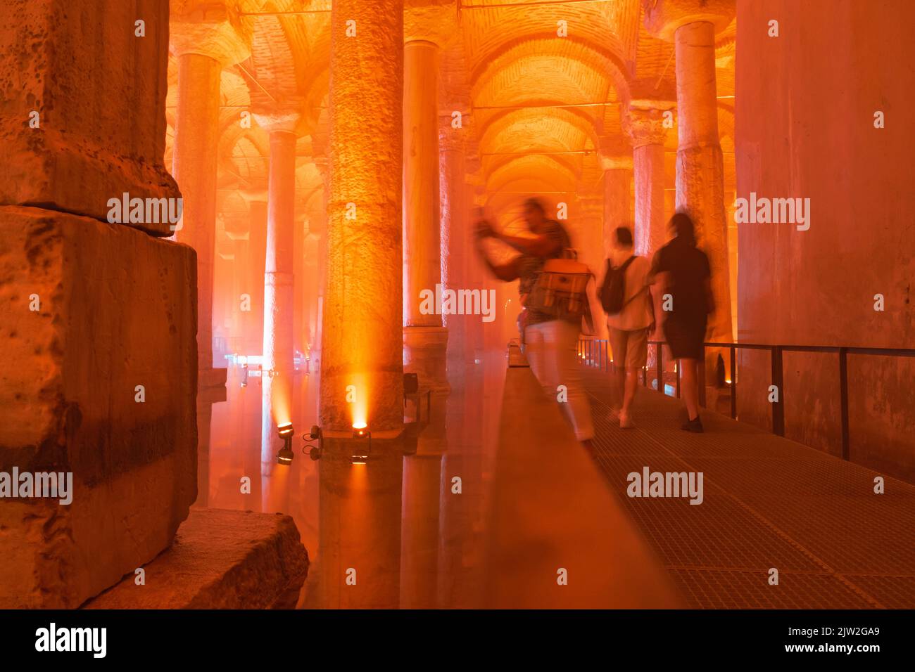 Tourists in Basilica Cistern. Travel to Istanbul photo. Noise and grain ...