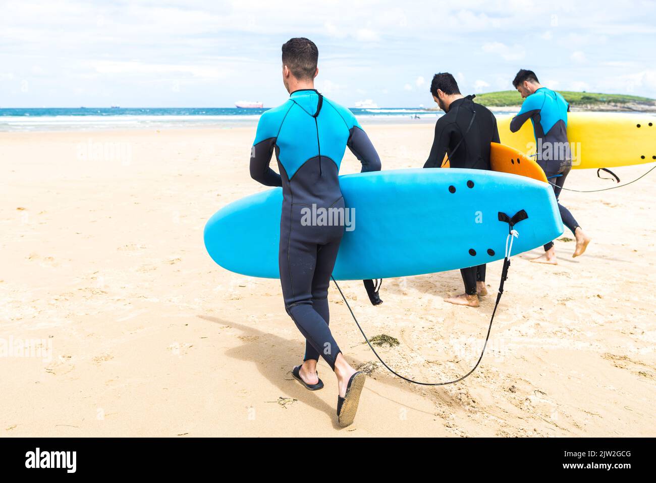 Back view full body of fit young ethnic male friends with dark hair in ...