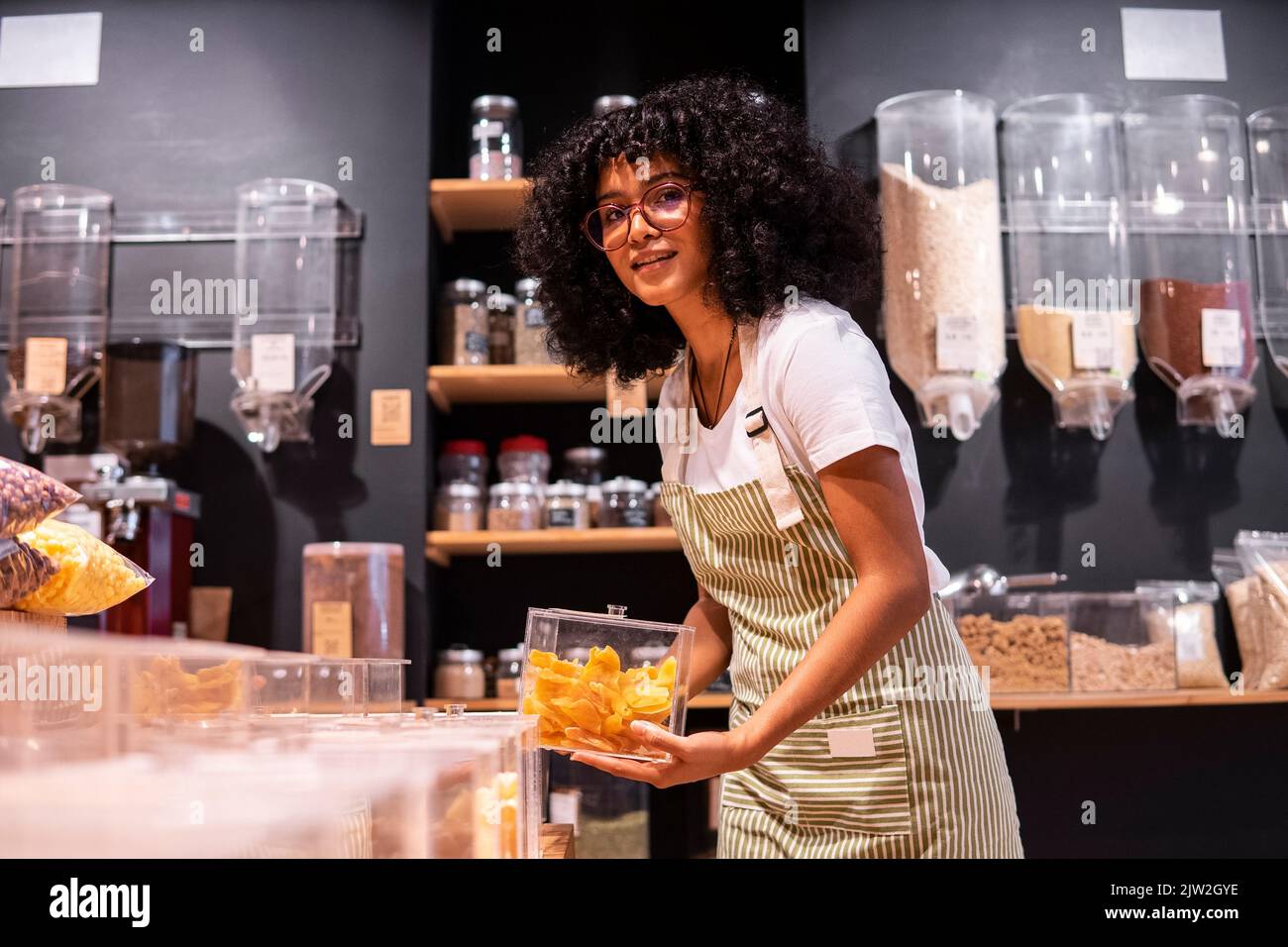 Putting box on shelf hi-res stock photography and images - Alamy