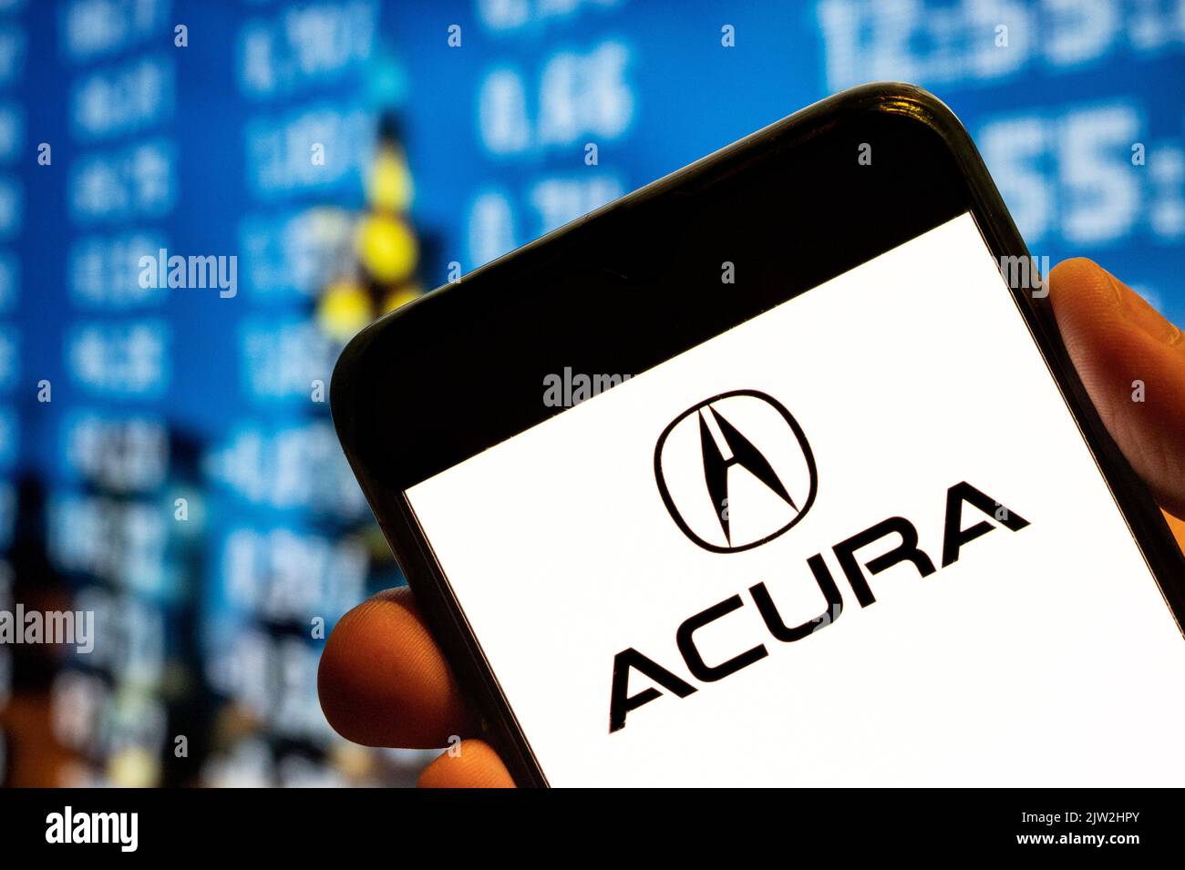 In this photo illustration, the Japanese luxury automobile brand owned ...