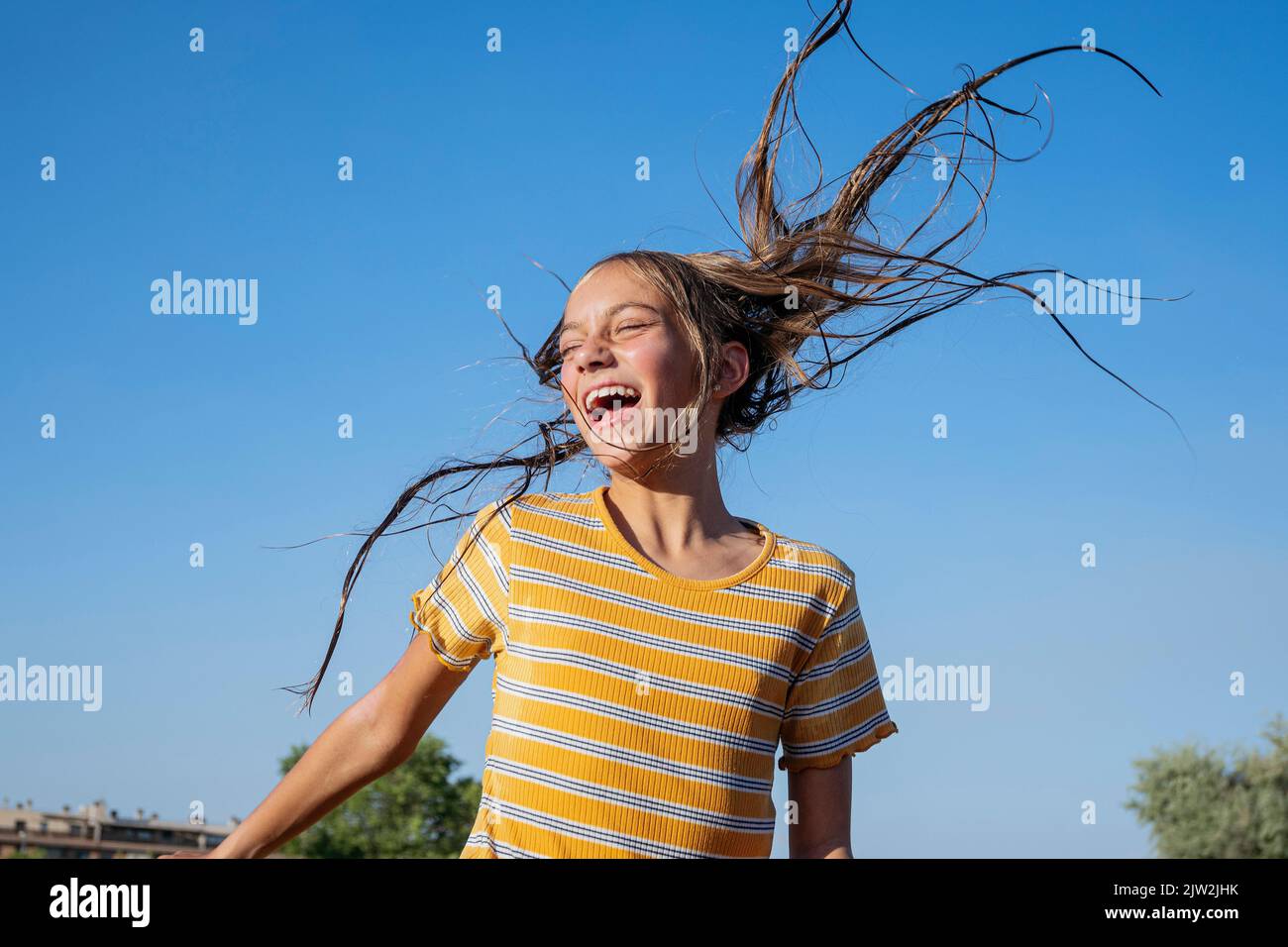 Cheerful wet teen girl hi-res stock photography and images - Alamy