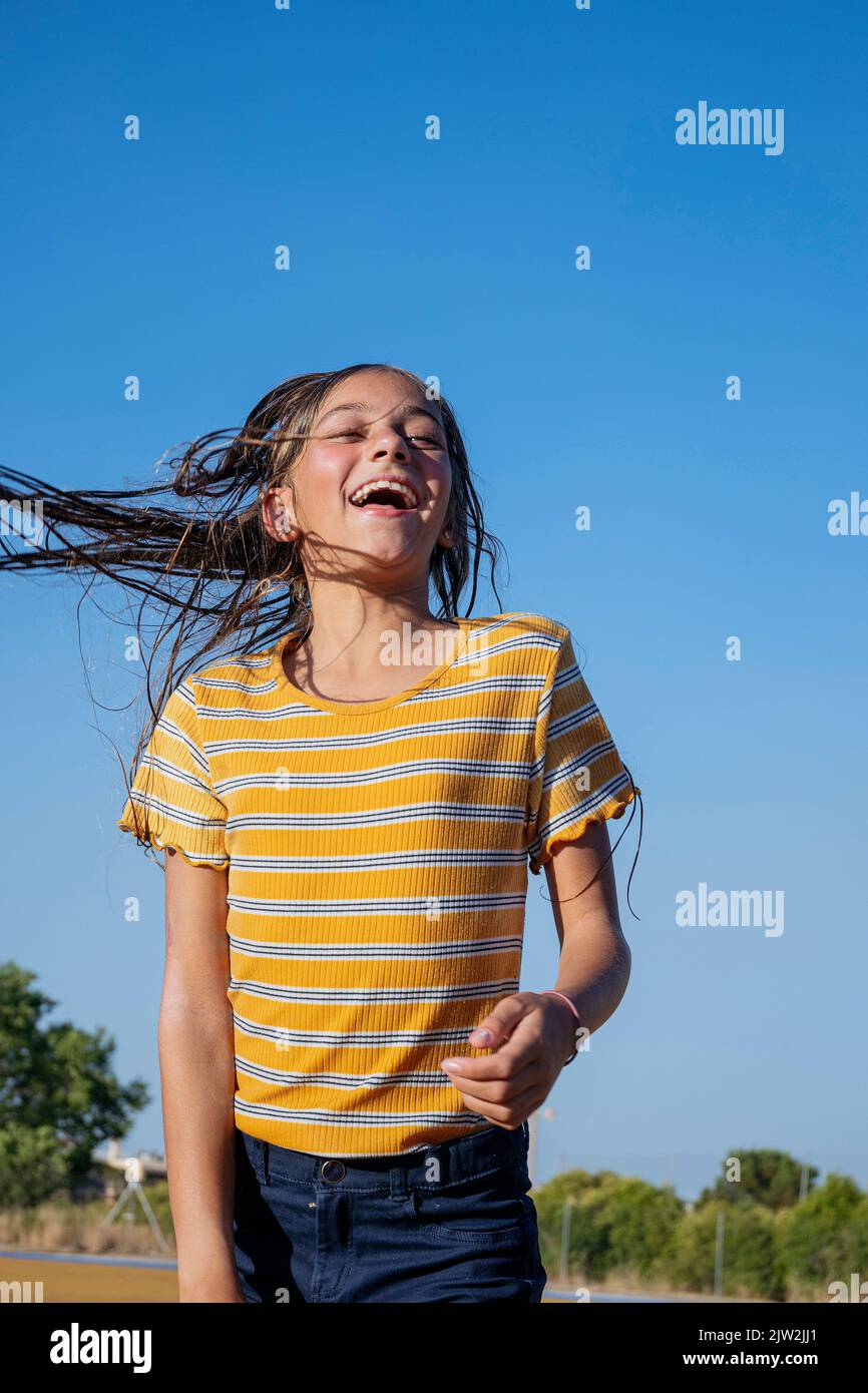 Cheerful wet teen girl hi-res stock photography and images - Alamy