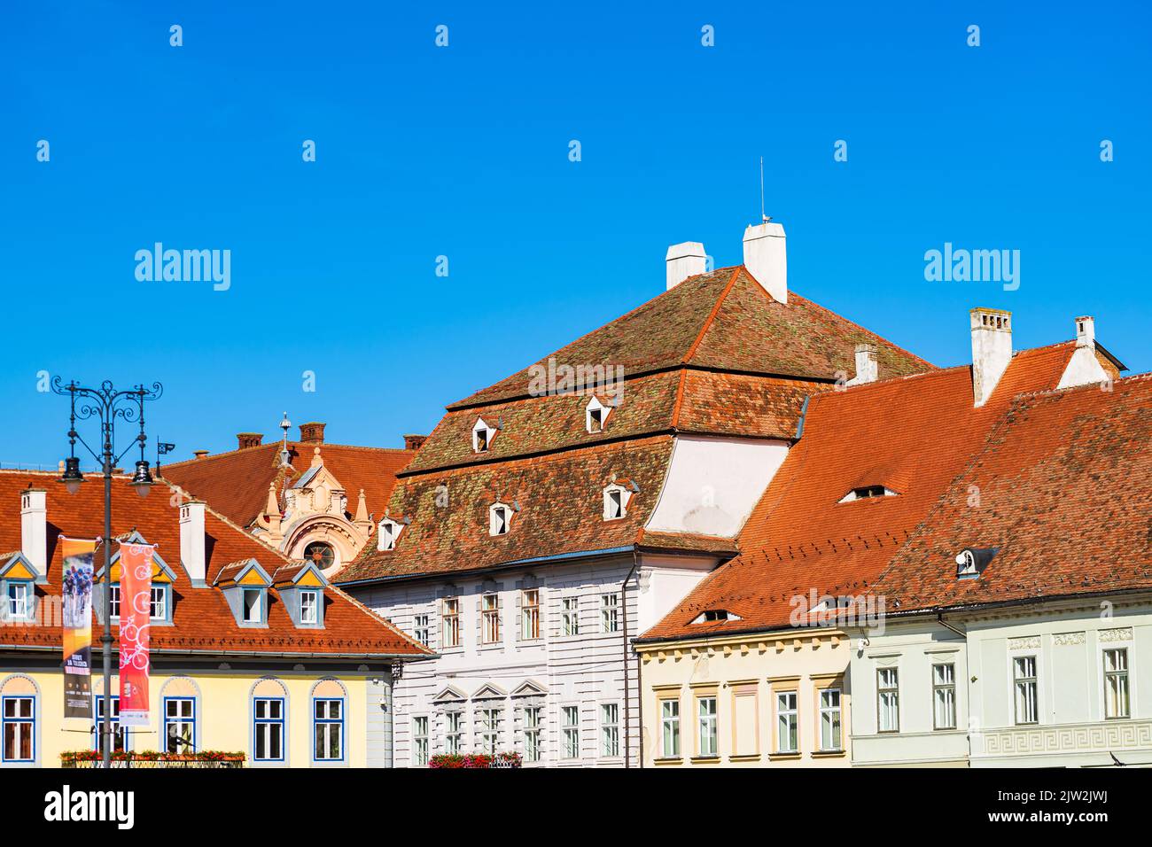 traditional colorful old houses and arquitecture in Sibiu, Romania ...