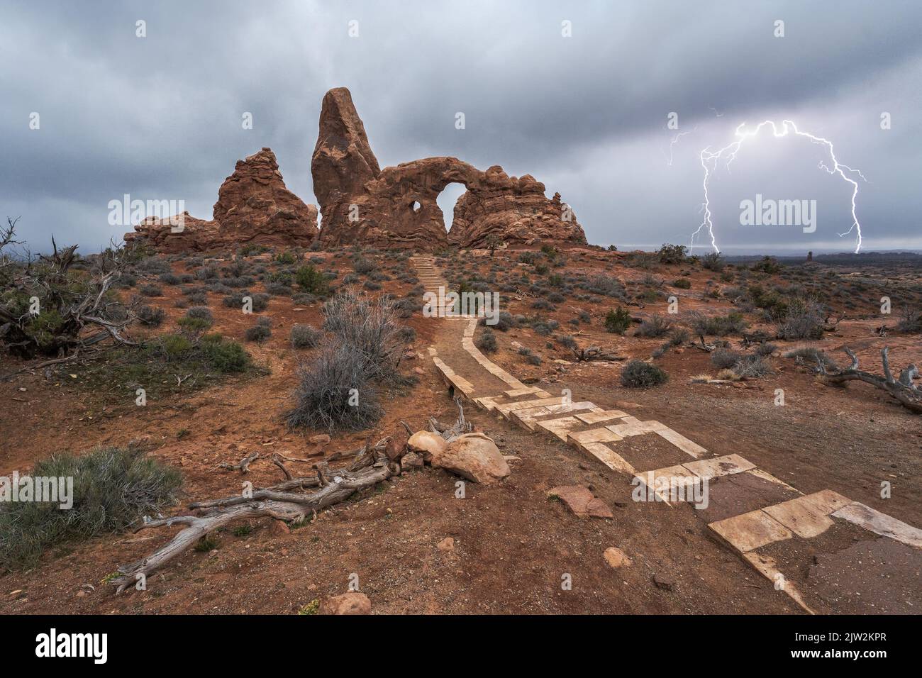 Shabby stairs leading to Turret Arch against cloudy gray sky with ...