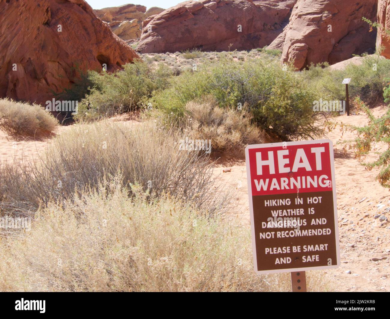 A heat warning sign in a hiking area Stock Photo - Alamy