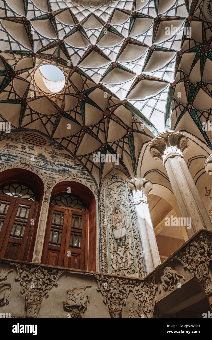 From below of traditional medieval mosque with arched elements and ...
