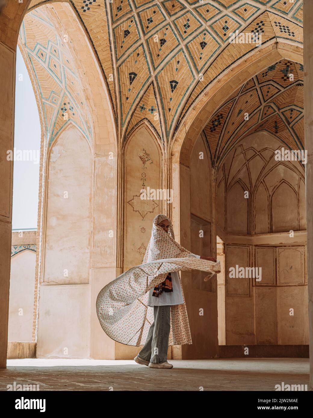 Full body side view of female in authentic clothes standing in ...