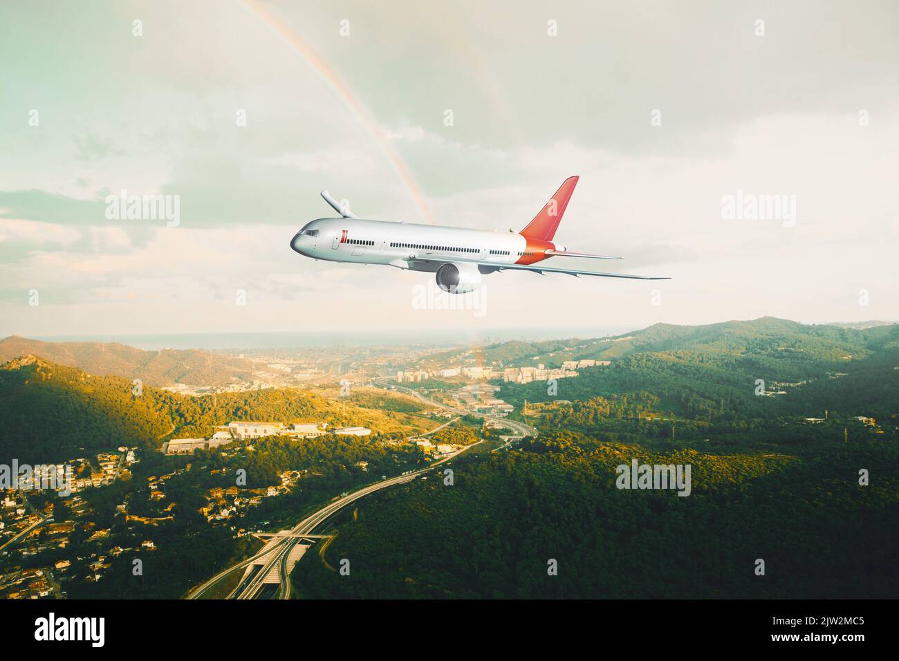 Side view of a commercial airplane flying over urban areas at sunset ...