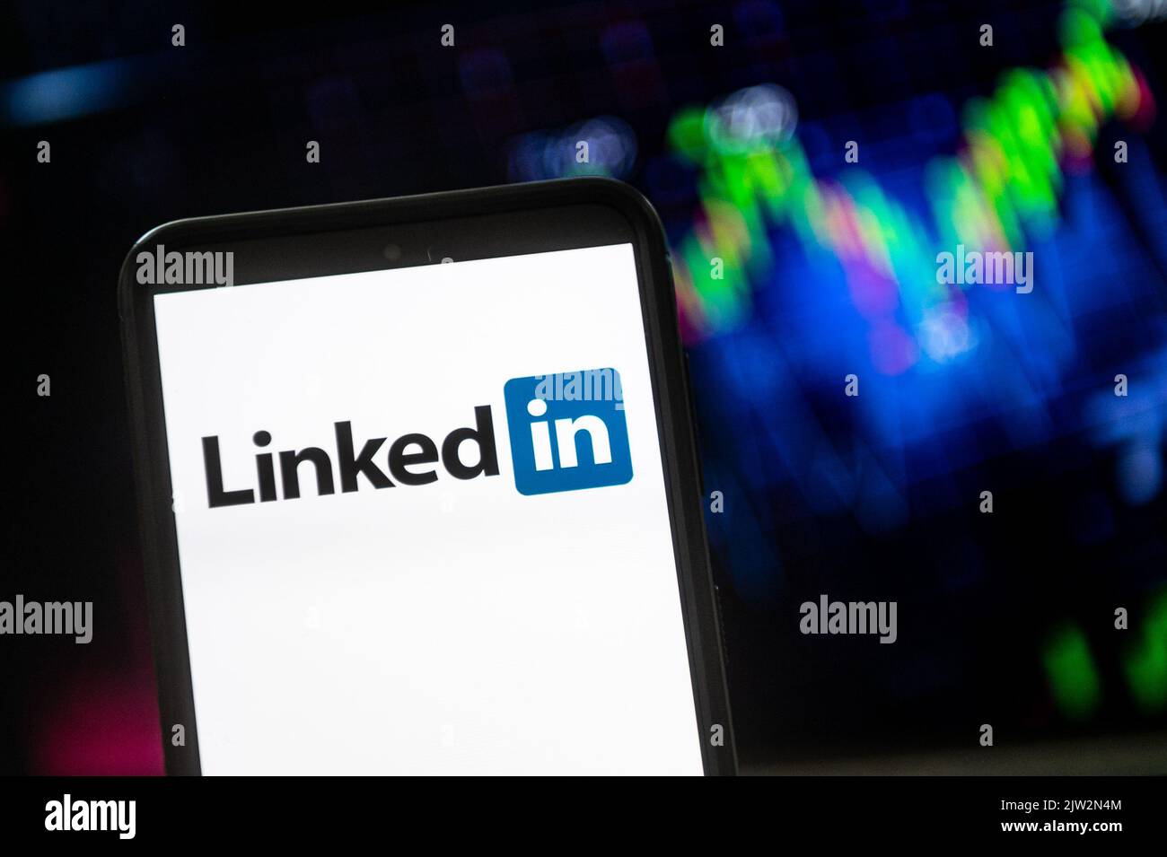 In this photo illustration a LinkedIn logo seen displayed on a ...