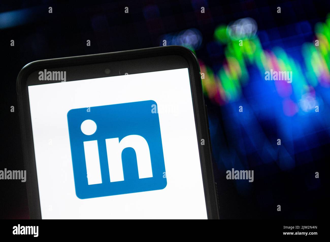 In this photo illustration a LinkedIn logo seen displayed on a ...