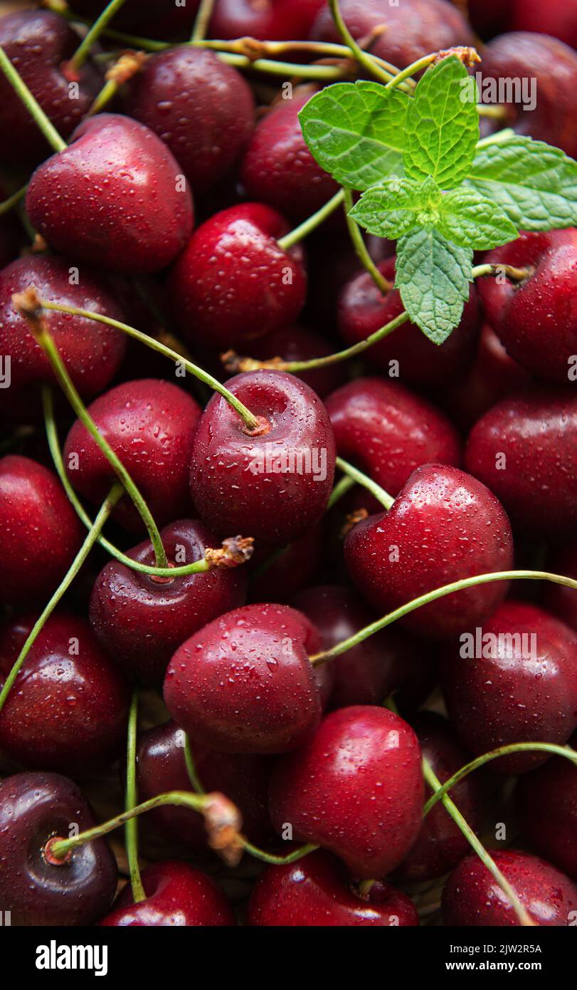 Fresh red cherries fruit as a natural food background Stock Photo - Alamy