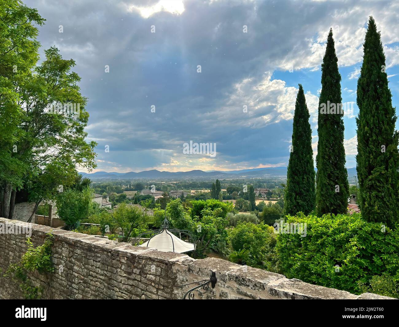 Colorful scenic mediterranean landscape view with a blue sky and clouds ...