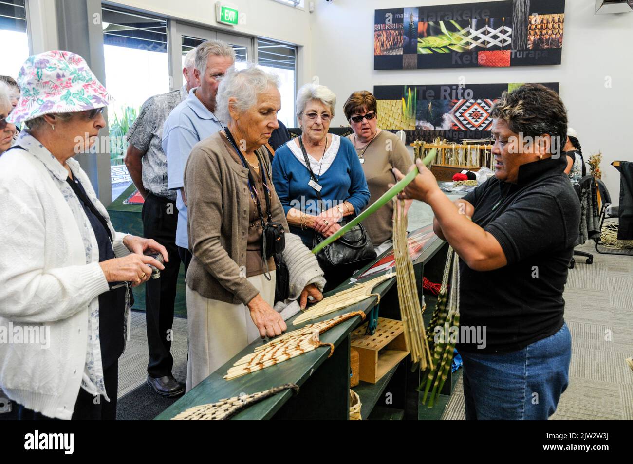 Visitors are shown some of the hand-weaved Maori garments at Te Puia ...