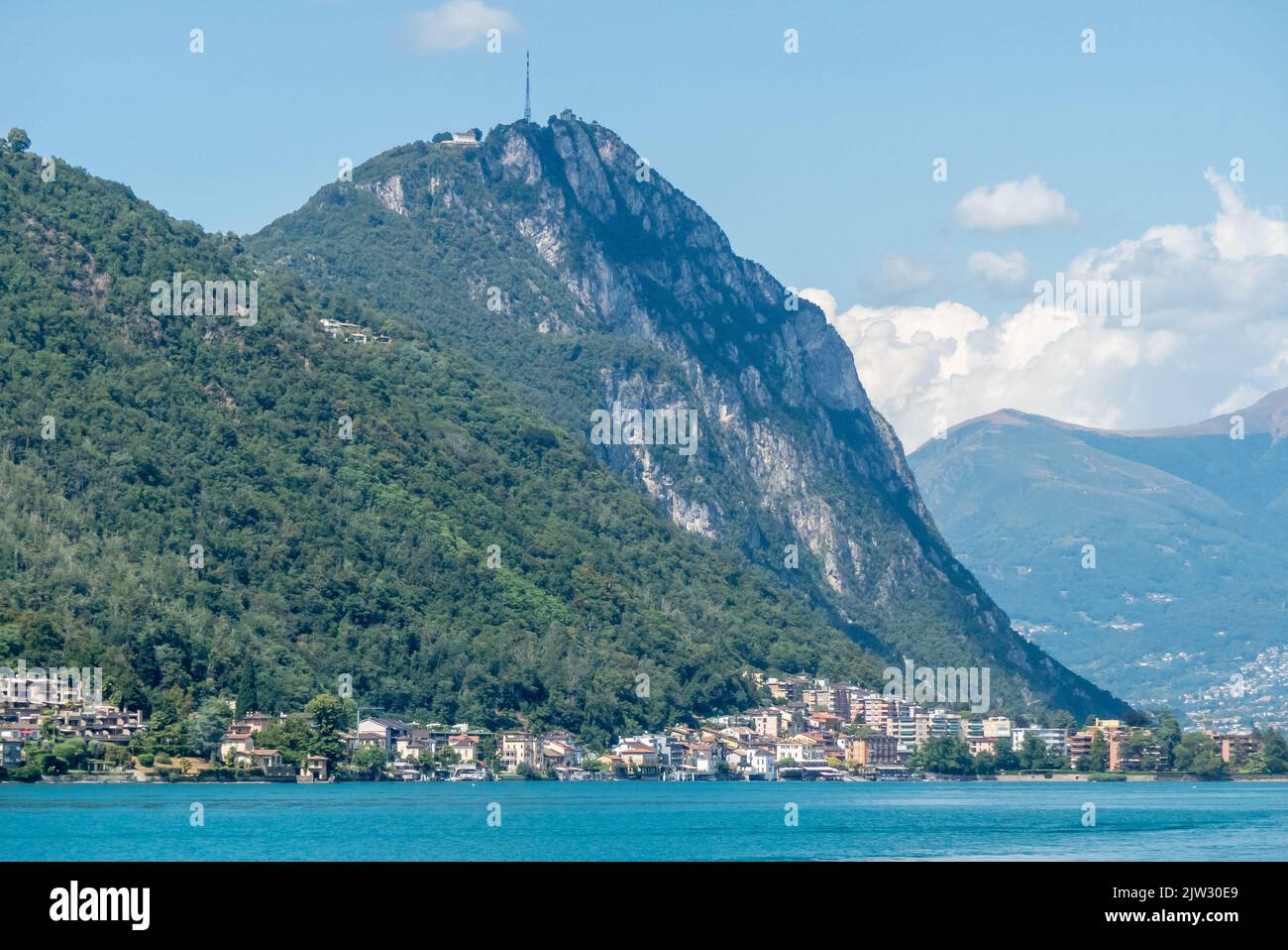 Lake Lugano in Switzerland: the town of Melide and Monte San Salvatore ...
