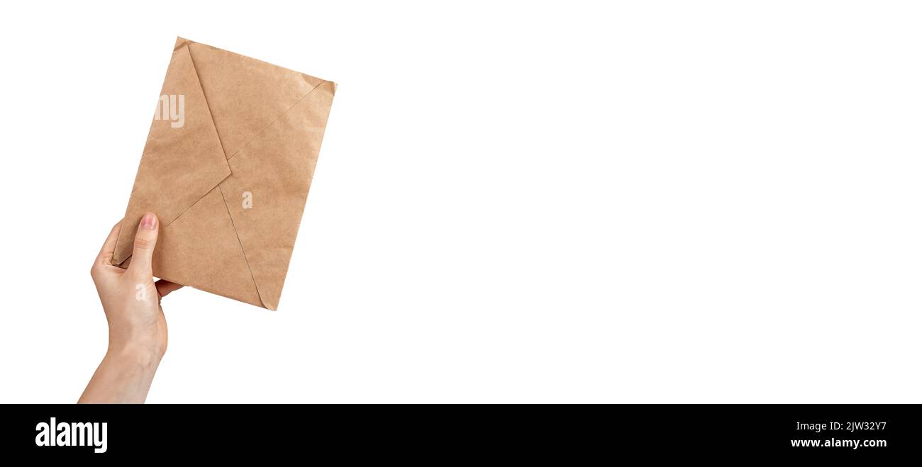 Banner with hand holding kraft paper envelope isolated on white ...