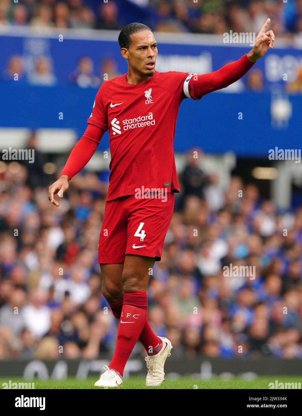 Liverpool's Virgil van Dijk gives a thumbs up to the fans ahead of the ...