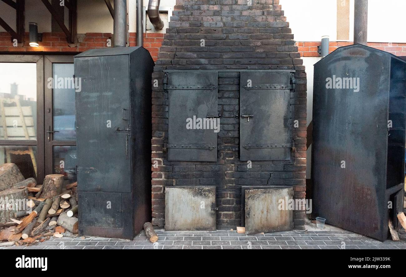 Mielno, Poland - February 14, 2022: Fish smoking. Smokehouse in a ...