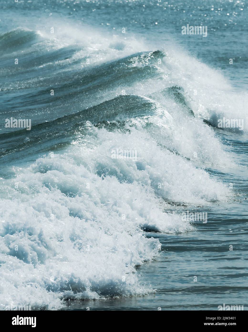 Moody waves crashing into shore at Praa sands beach Cornwall Stock Photo - Alamy