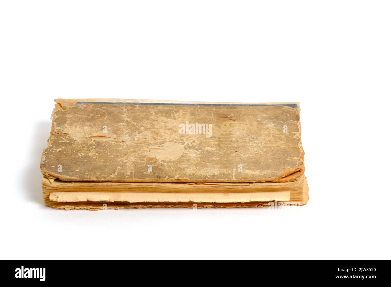 Old battered and yellowed book white background Stock Photo - Alamy