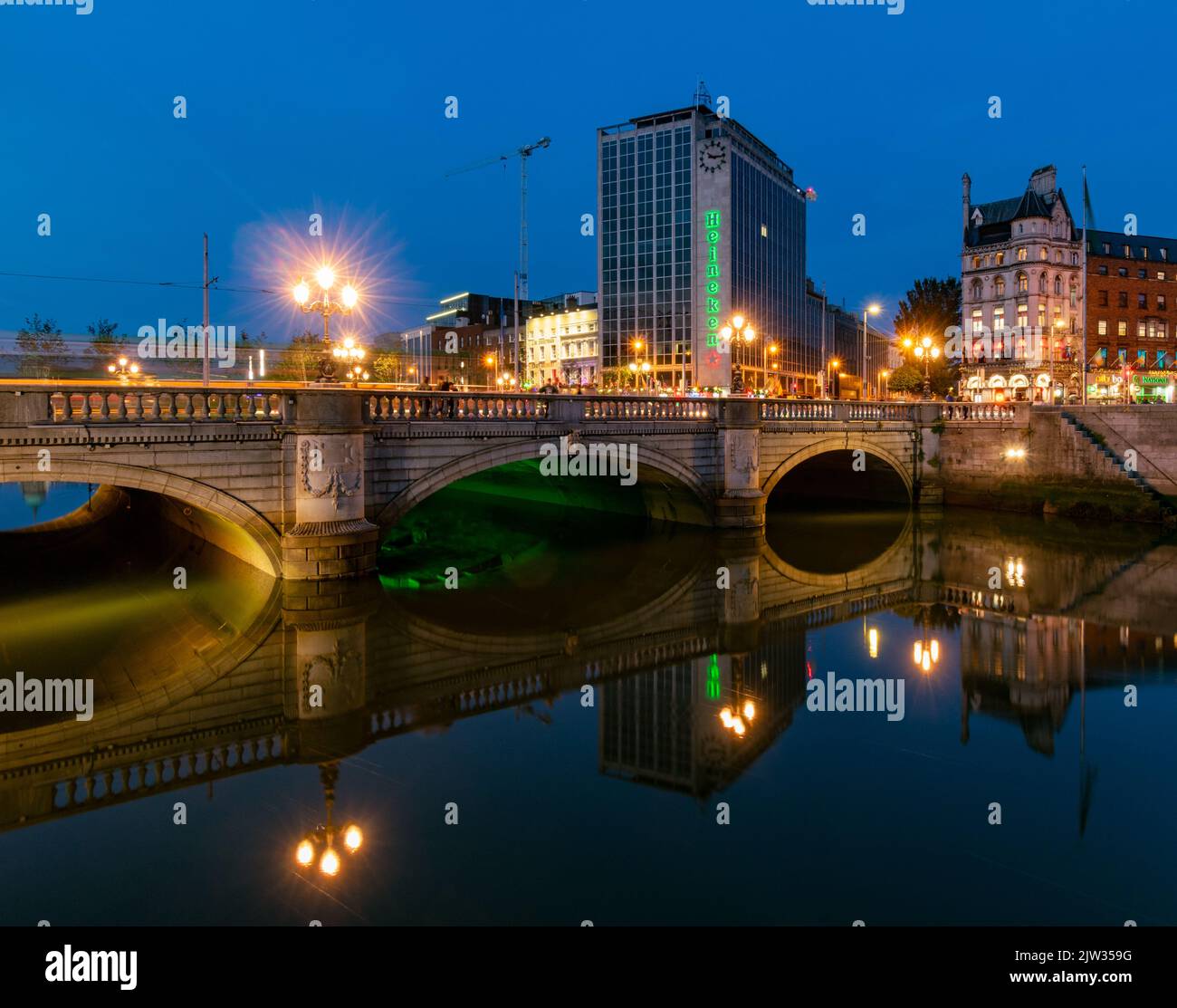O'Connell Bridge reflection perfection at blue hour Stock Photo - Alamy