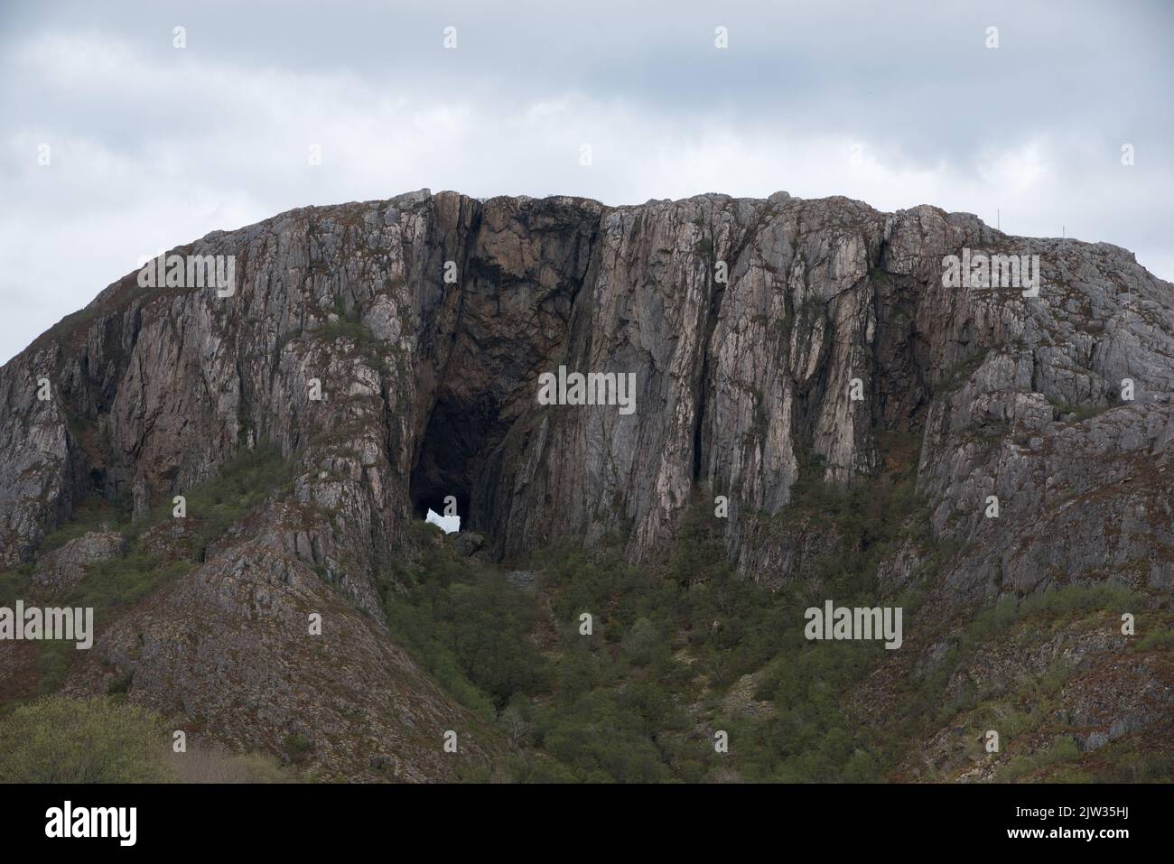Torghatten is a granite dome in central Norway where waves, frost and ...